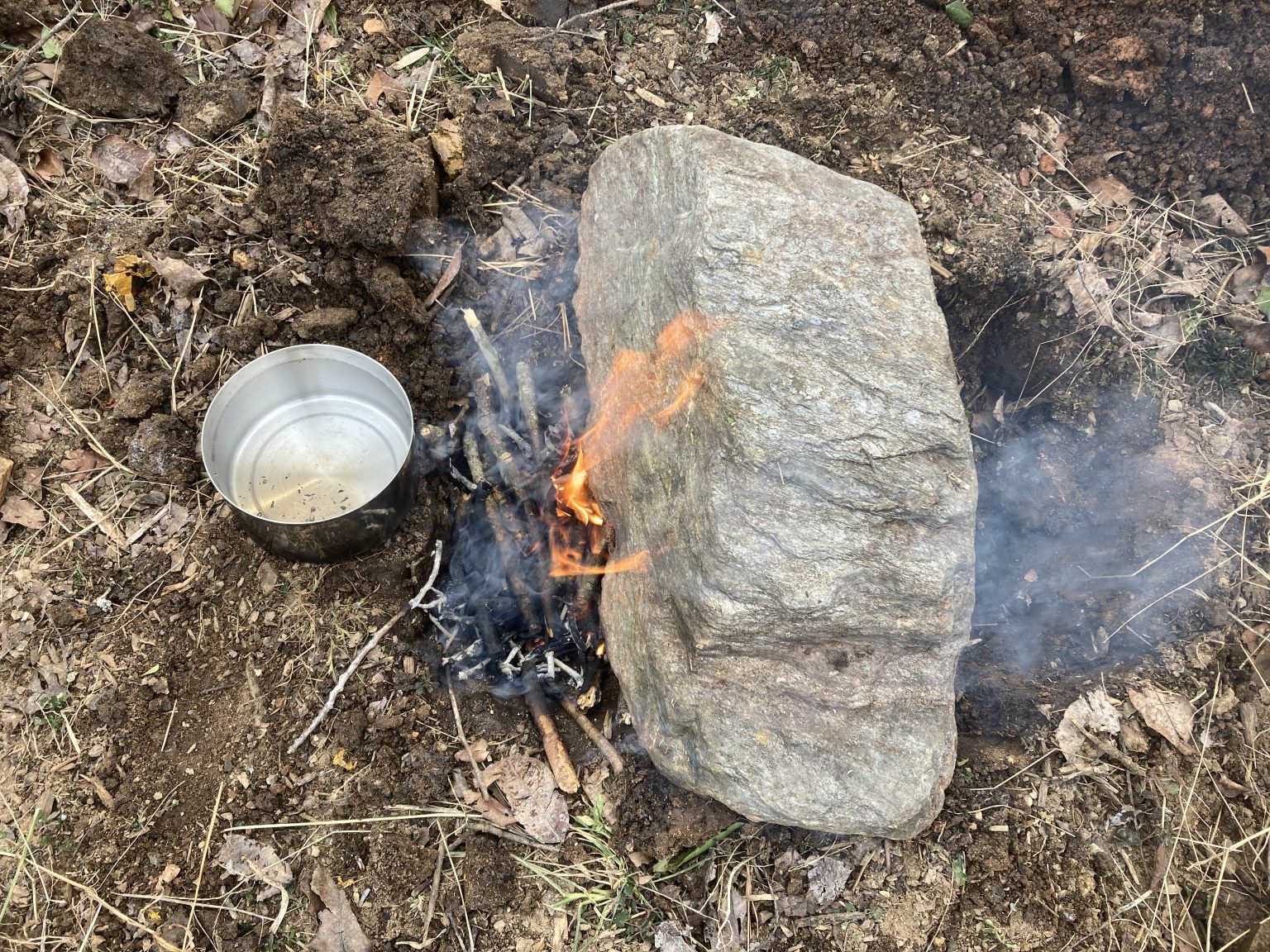 Using a Rock to Build a Dakota Fire Hole - The Organic Prepper