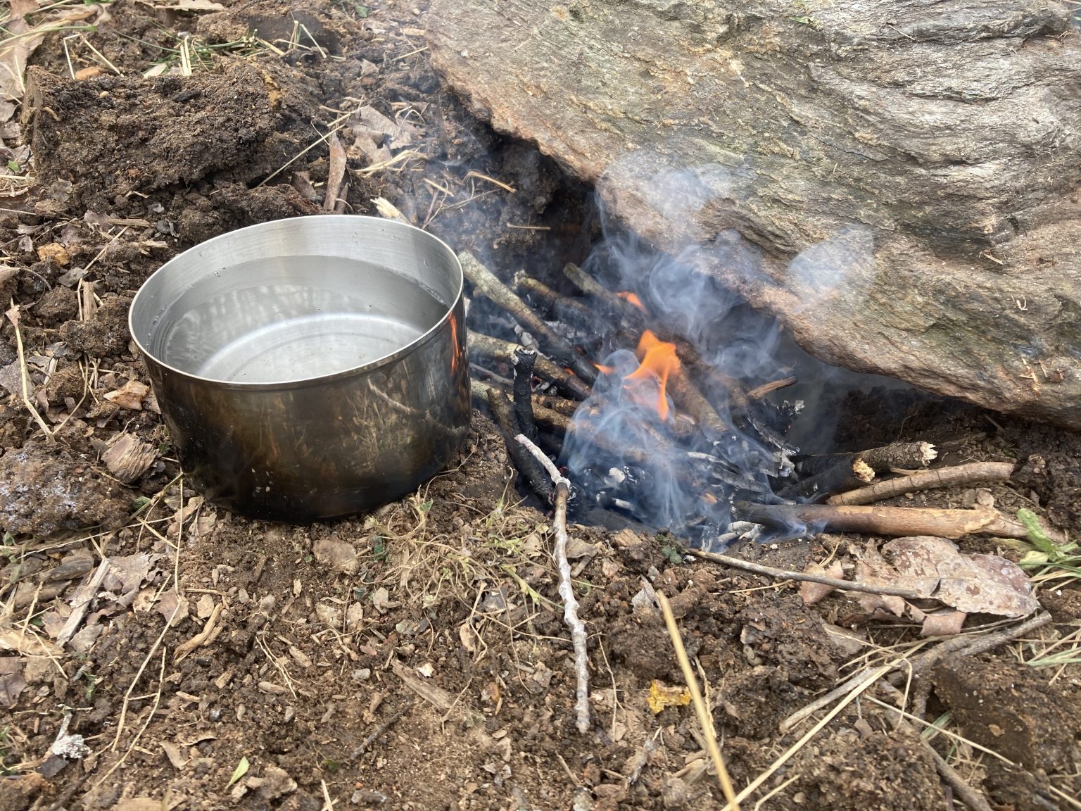 Using a Rock to Build a Dakota Fire Hole - The Organic Prepper